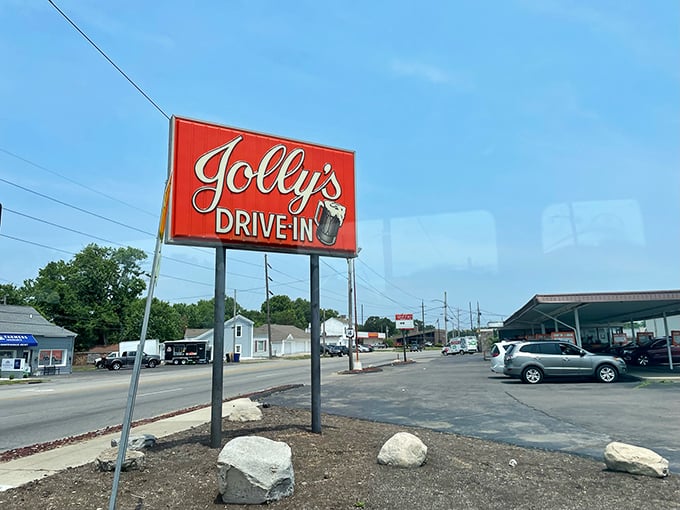 The Jolly's sign stands tall against the Ohio sky, a landmark that's guided hungry travelers for generations. Some beacons lead ships home; this one leads to root beer.