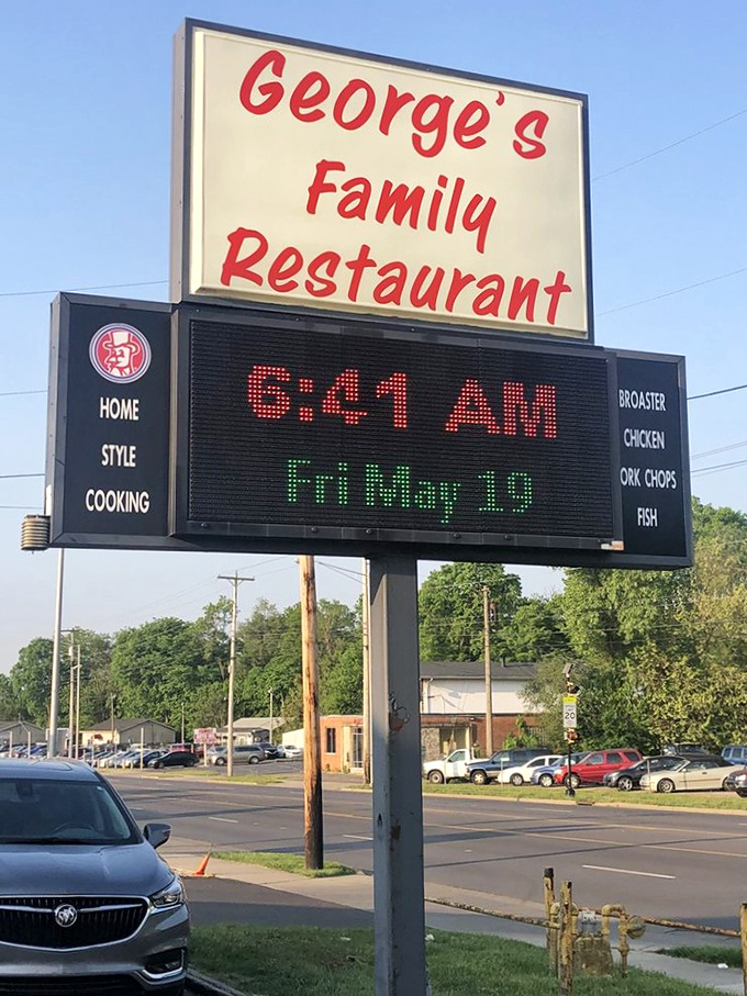 The roadside sign announcing 6 AM isn't just telling time &ndash; it's issuing a challenge to early birds seeking breakfast supremacy.