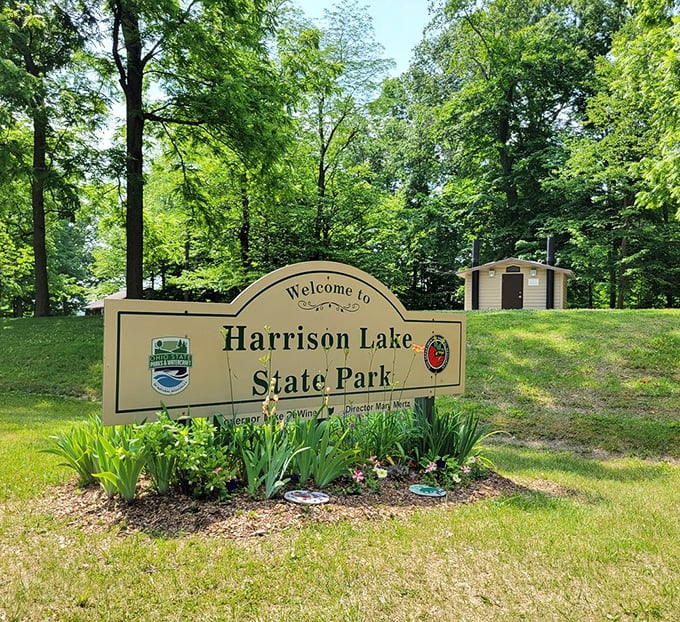 Every great adventure begins with a welcome sign, and Harrison Lake's stands like a promise of the natural wonders waiting just beyond.