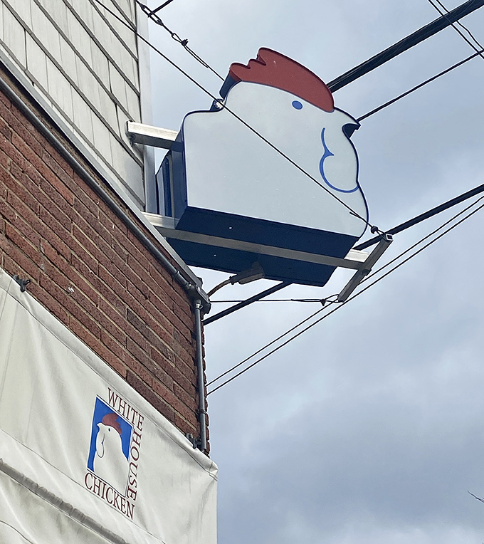 The iconic chicken sign watching over Barberton like a crispy guardian angel. Follow the beak to flavor country.