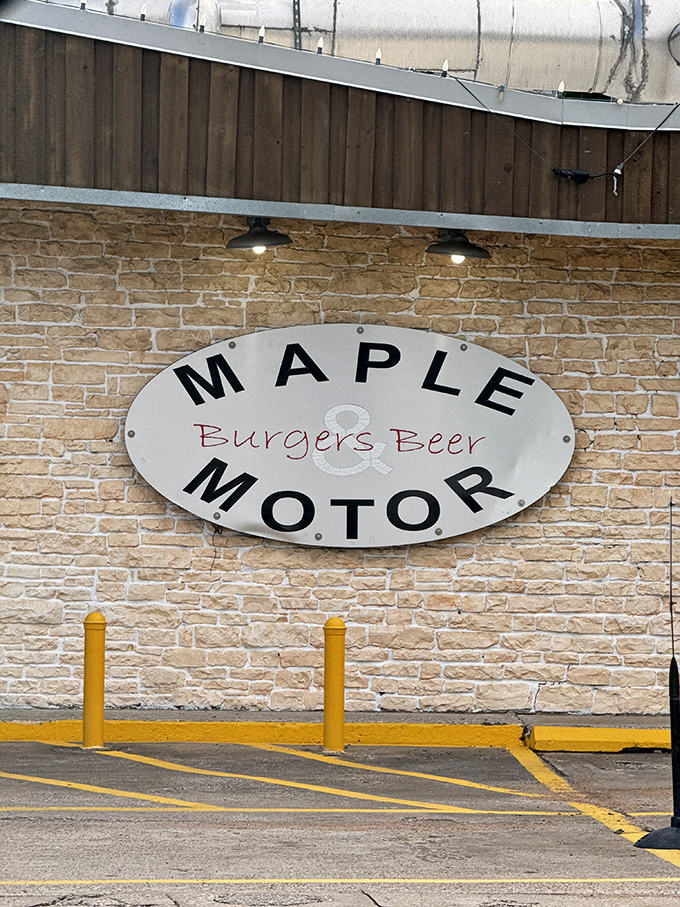 Maple & Motor: Burgers Beer announces the oval sign—a straightforward promise that's fulfilled with every juicy bite served inside.