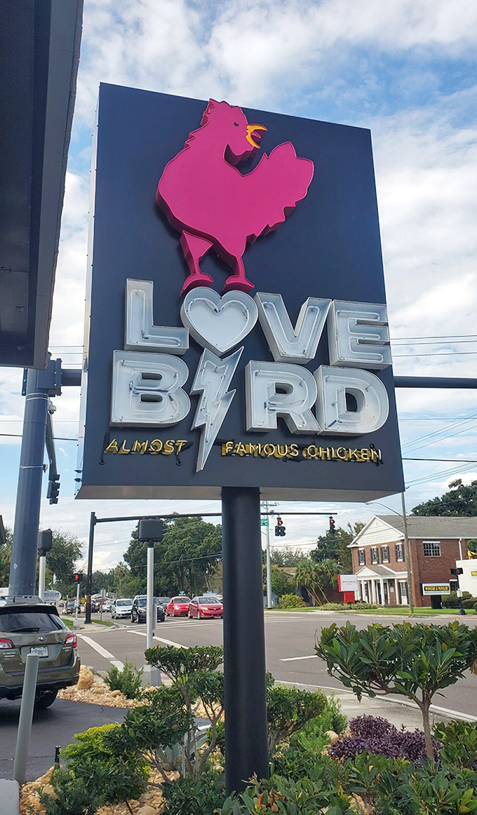 That pink chicken silhouette against the dark background isn't just a logo&mdash;it's a landmark for flavor-seekers throughout Central Florida.