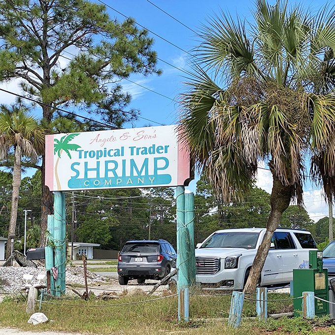 The roadside sign stands as a beacon for hungry travelers. Like a lighthouse guiding ships, it steers appetites toward seafood salvation.
