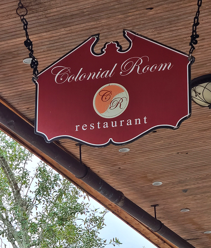 The hanging wooden sign swings gently outside, a rustic invitation to one of Sanford's most beloved culinary institutions.