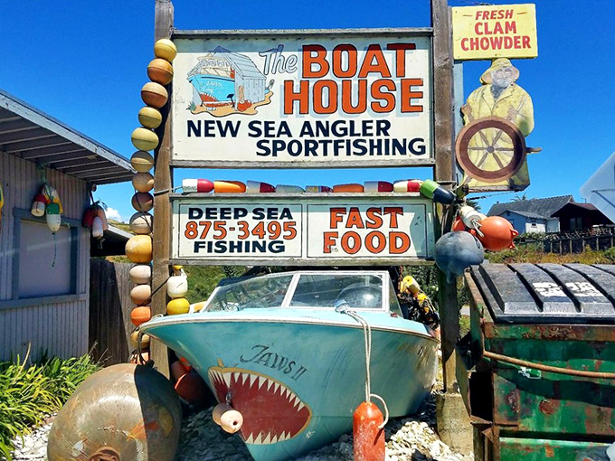 The sign announces your arrival at seafood nirvana&mdash;complete with a shark-mouthed boat that seems to say "we're serious about our fish."