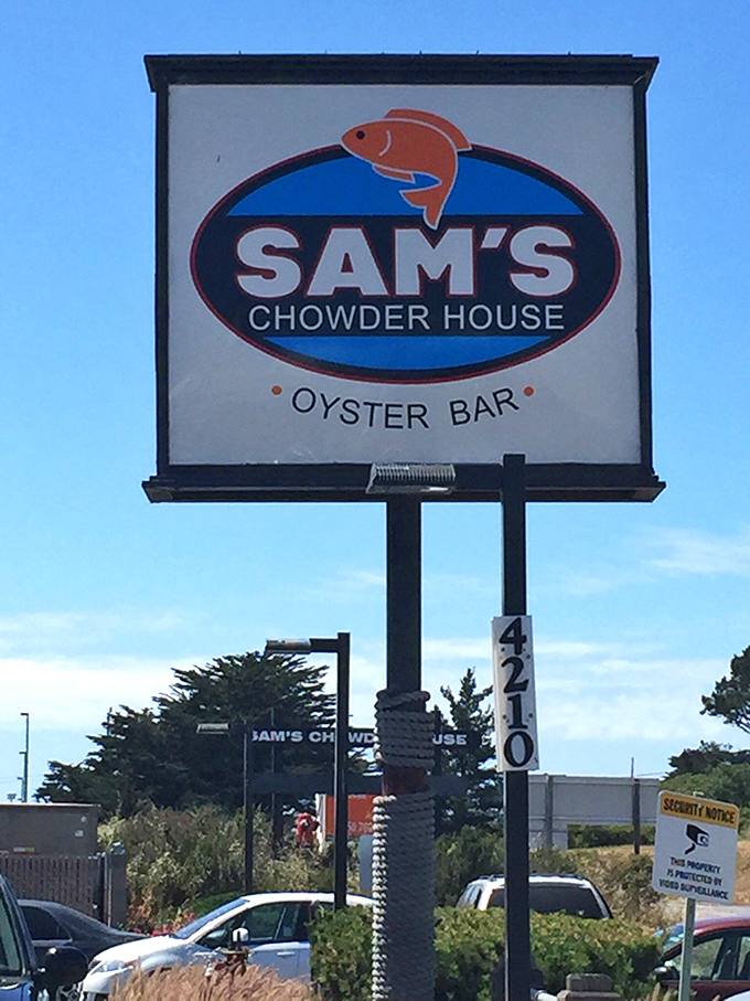 The cheerful sign stands as a promise: beyond this point, extraordinary seafood experiences await the hungry traveler.