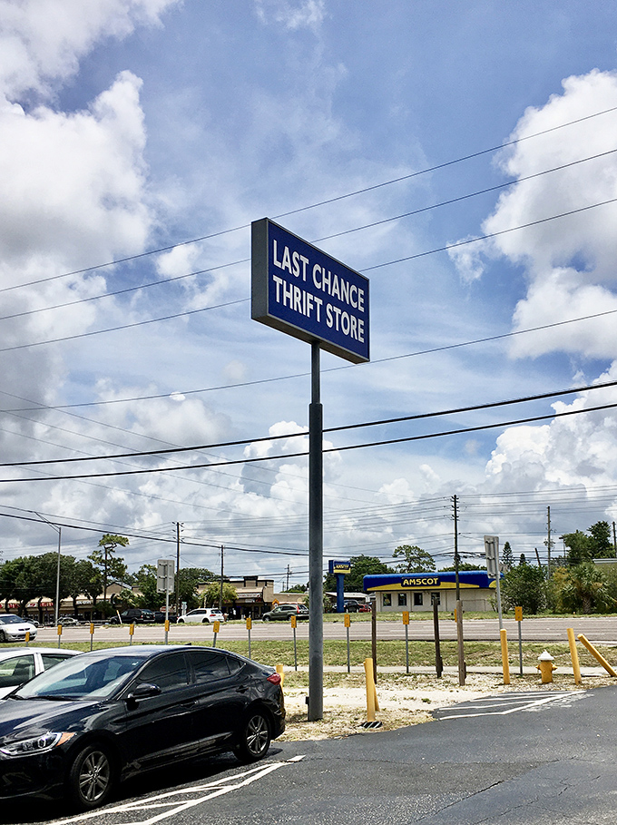 Standing tall against Florida's brilliant blue sky, the Last Chance sign promises retail therapy and environmental virtue in one stop.