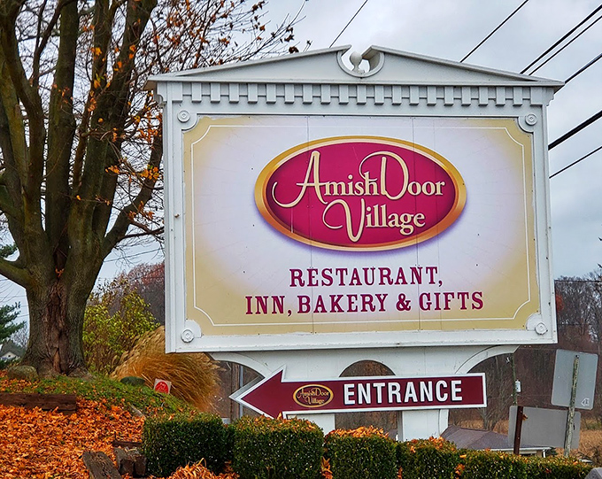 The sign doesn't just mark a location—it promises an experience. Restaurant, inn, bakery, and gifts: the four food groups of vacation happiness.