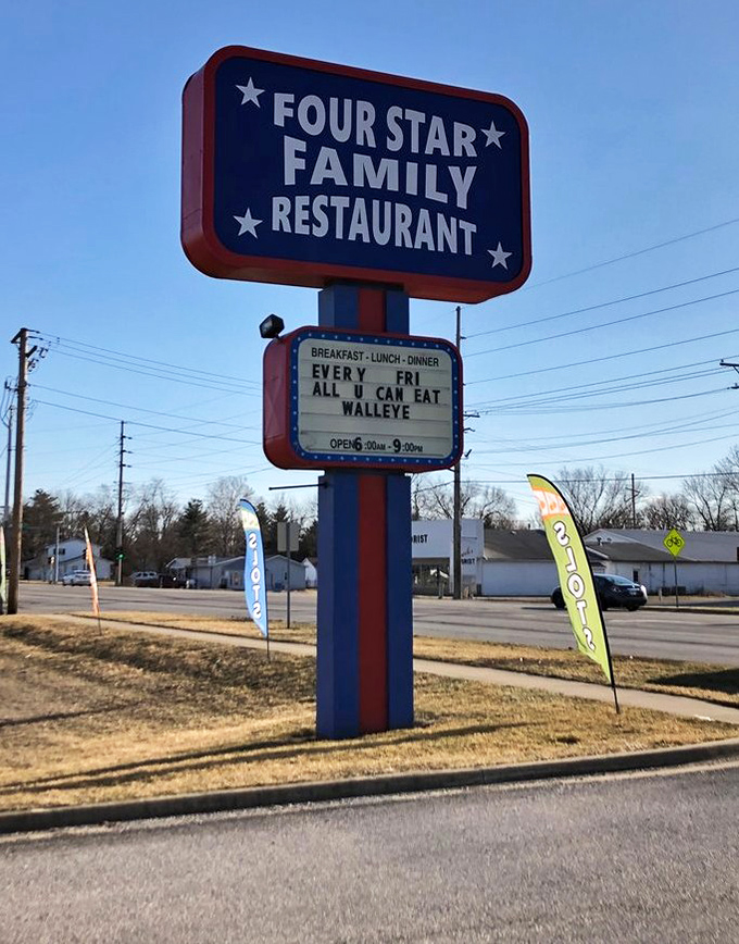 The roadside sign doesn't just announce a restaurant&mdash;it's a beacon of hope for hungry travelers and a weekly bulletin board for walleye enthusiasts.