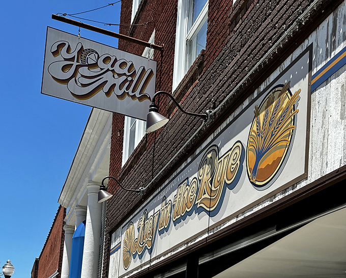 The sign hangs like a beacon for breakfast pilgrims, promising salvation in the form of perfectly cooked eggs and house-made hollandaise.