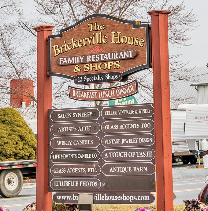 The sign tells more than directions—it's a roadmap to a complete Lititz experience, with the restaurant as the delicious main attraction.