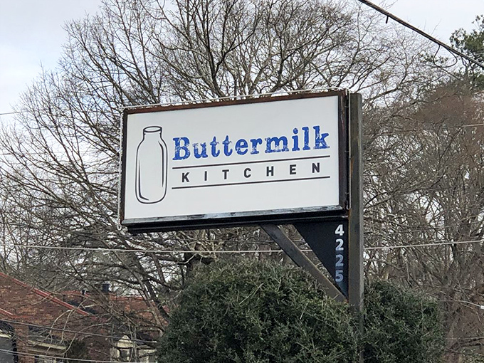 The simple, iconic sign with its milk bottle silhouette serves as a North Star for breakfast seekers navigating the Atlanta morning rush.