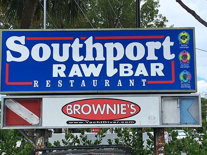 Simple signage that promises raw bar treasures inside, delivering more than any flashy billboard ever could.