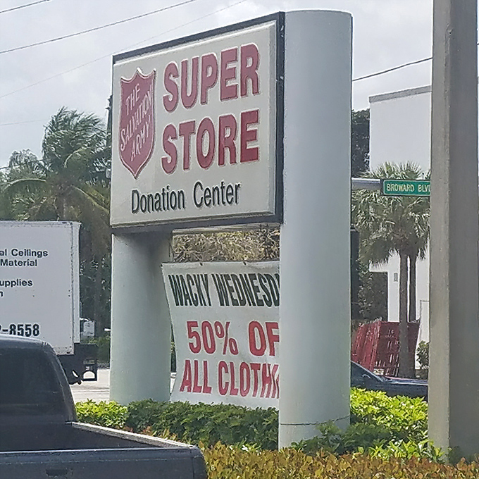 The roadside sign announces "Wacky Wednesday" discounts like a town crier for bargain hunters. Half-price clothing day is practically a local holiday.