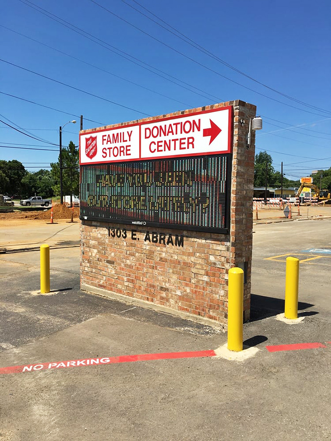 The sign says it all&mdash;one side for finding treasures, the other for giving them. The perfect circle of thrift store karma.