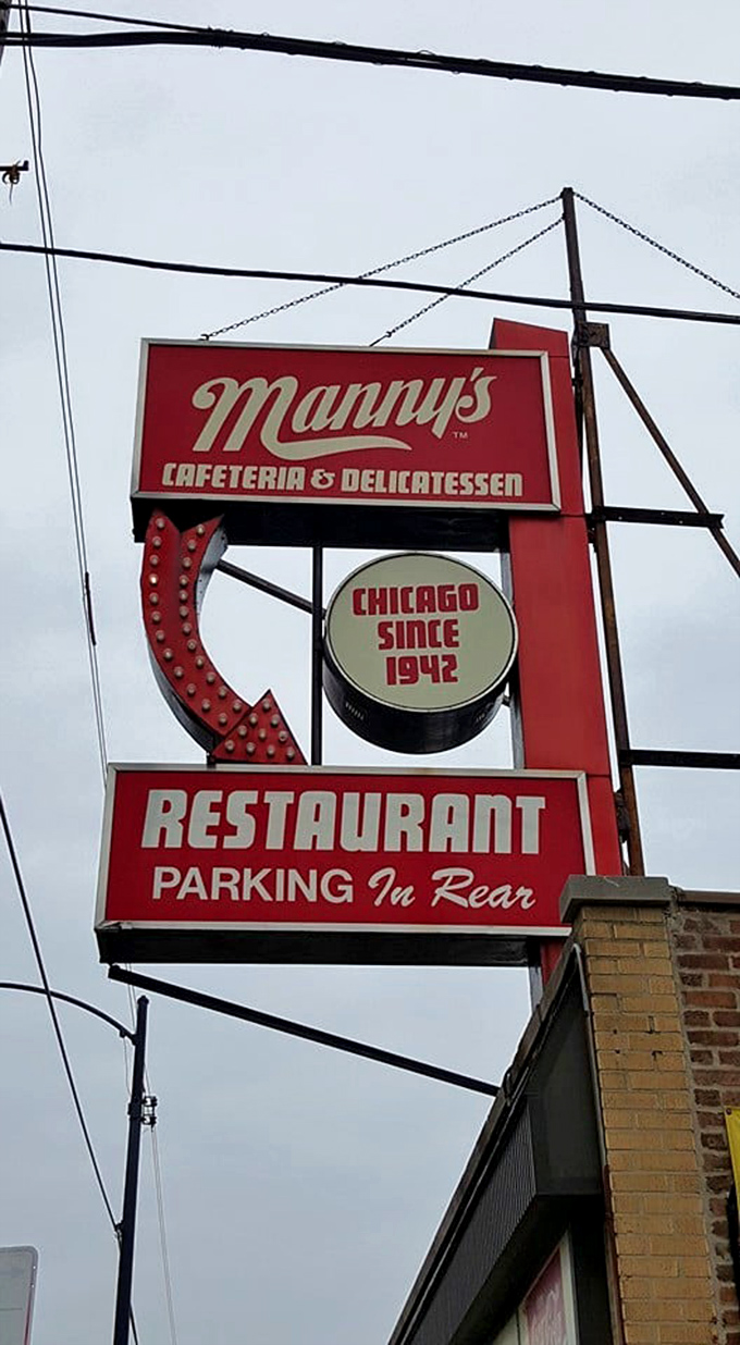The vintage sign glows like a North Star for sandwich seekers, guiding hungry travelers to deli nirvana since 1942.