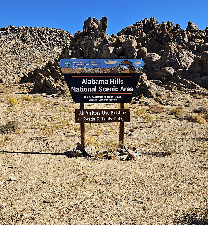 The official welcome sign that marks your entry into a landscape so cinematic, you'll feel like you're walking through a movie set.