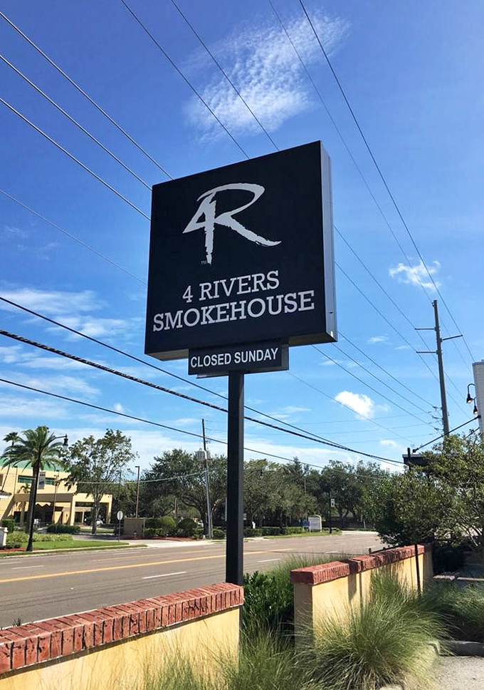 The beacon of barbecue – this sign has guided more hungry Floridians to smoked meat salvation than any GPS ever could.