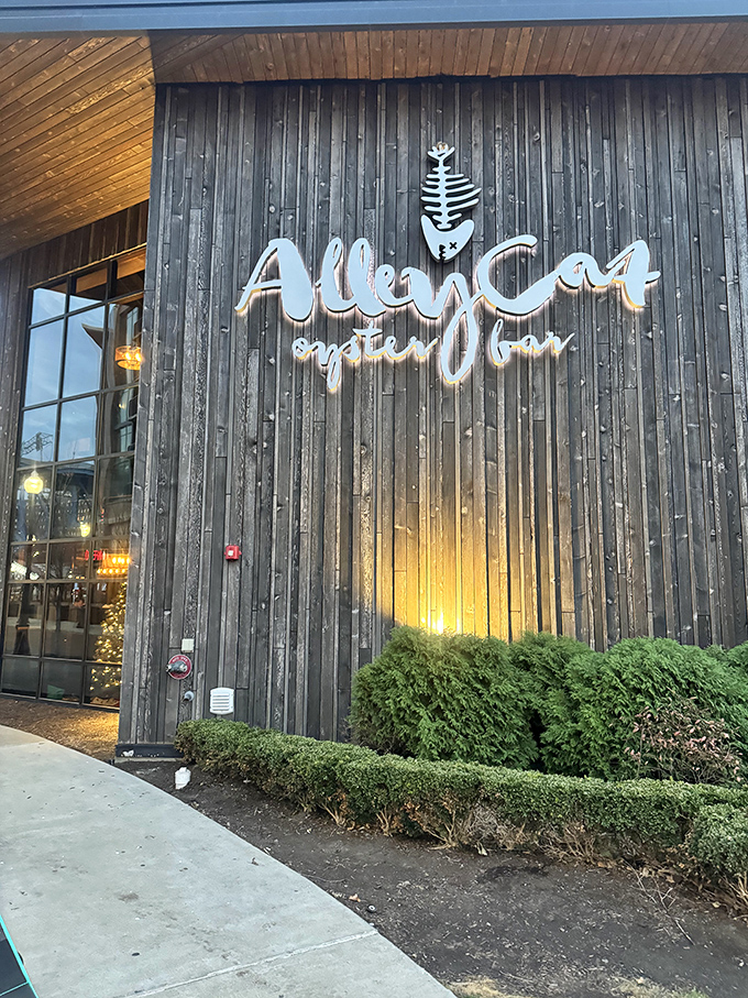 That fish skeleton logo isn't just cute branding&mdash;it's a promise that what's inside has been stripped down to the essential goodness. The weathered wood exterior tells you this place means business.