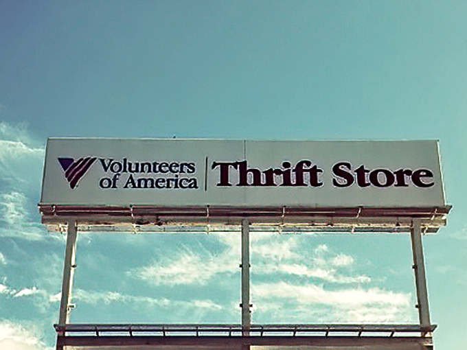 The billboard announces your arrival at bargain paradise. Under that big Ohio sky, this sign promises adventures in affordable retail therapy.