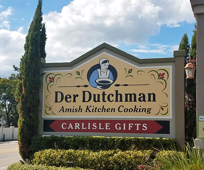 The sign says it all: "Amish Kitchen Cooking" promises authenticity, while your stomach whispers, "Yes, this is exactly what we've been looking for."