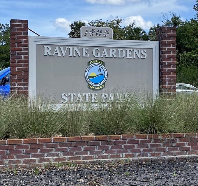 The official welcome sign stands proud. Behind this brick and mortar introduction lies a 59-acre wonderland that defies Florida stereotypes.