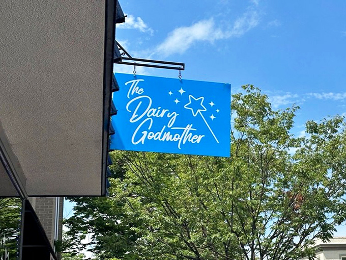 The blue sign shines like a dessert lighthouse, guiding sweet-toothed travelers safely to shore. Follow the stars to frozen paradise.