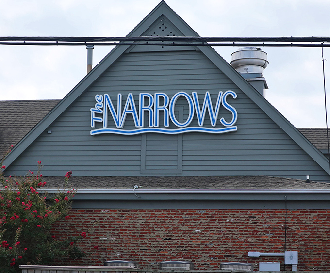That neon sign doesn't just mark a restaurant&mdash;it's a beacon guiding hungry travelers to crab cake nirvana. The brick below has heard thousands of "best meal ever" declarations.