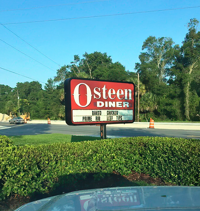 That sign is more than directions—it's a beacon of hope for hungry travelers. When you see "O'Steen Diner," you know salvation by comfort food awaits.