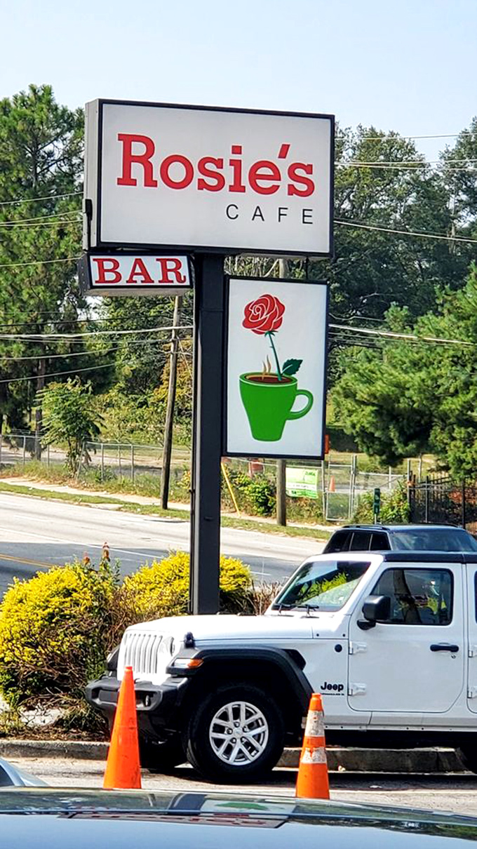 A roadside sign that's changed many a traveler's plans. That rose in a coffee cup isn't just a logo—it's a promise of good things to come.