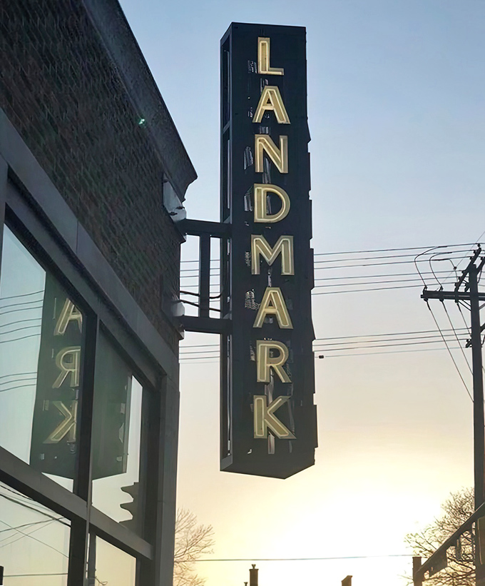 As dusk falls, that illuminated sign transforms into a lighthouse for the hungry, guiding BBQ enthusiasts safely to flavor harbor.