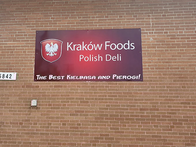 The sign says it all—"The Best Kielbasa and Pierogi!" No false advertising here, just a brick wall of truth.