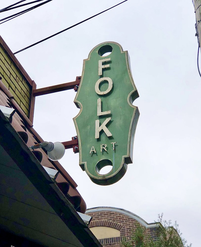 The iconic Folk Art sign stands as a beacon of breakfast hope in Inman Park, guiding hungry pilgrims to their delicious destiny.
