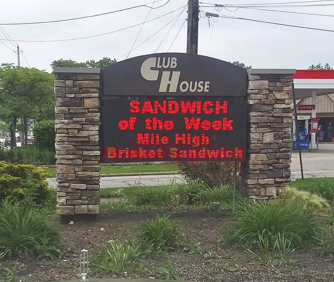 The digital marquee announces this week's sandwich special with the enthusiasm of a town crier sharing news of a royal visit.