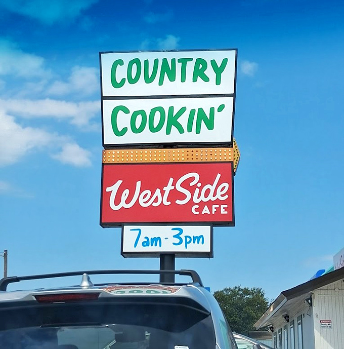 That vintage sign against the Texas sky promises "Country Cookin'" with the confidence of someone who knows exactly what you're craving.
