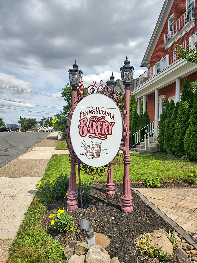 The signature sign stands proud, a beacon of hope for the hungry and a landmark for those who navigate by their sweet tooth.