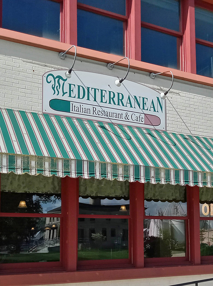 The hanging sign swings gently in Ohio breezes, an invitation to experience a slice of Mediterranean sunshine regardless of Midwest weather forecasts.