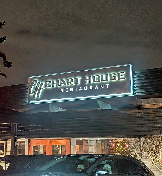 At night, the Chart House sign glows with the promise of memorable meals, like a bat signal for anyone suffering from hunger-induced grumpiness.