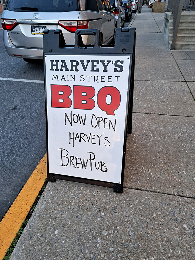 Street signage that cuts to the chase – BBQ and beer, the dynamic duo of culinary satisfaction. No false advertising here.