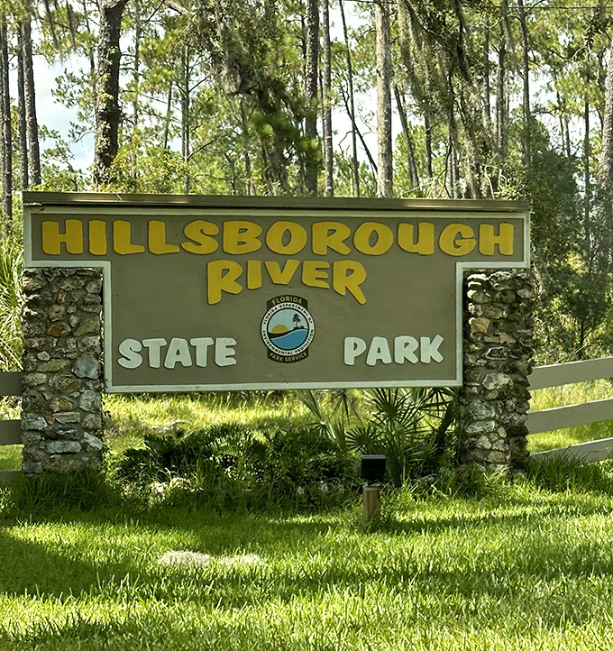 The park entrance sign promises 3,383 acres of natural Florida behind those stone pillars. Your theme-park alternative awaits.