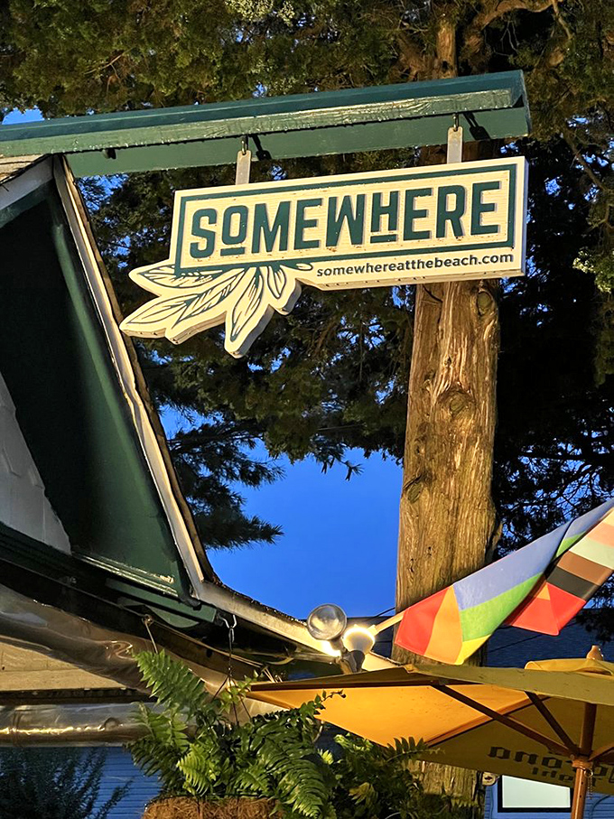 The outdoor patio, with its canopy of yellow umbrellas and pink petunias, creates a microclimate of vacation vibes regardless of what day of the week it is.
