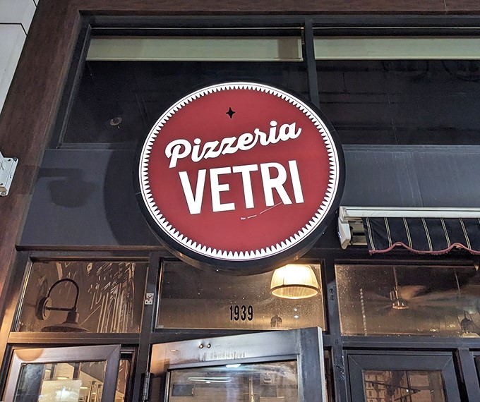 By day or night, that red sign serves as a beacon for the pizza-obsessed. Consider it Philadelphia's North Star for the hungry.