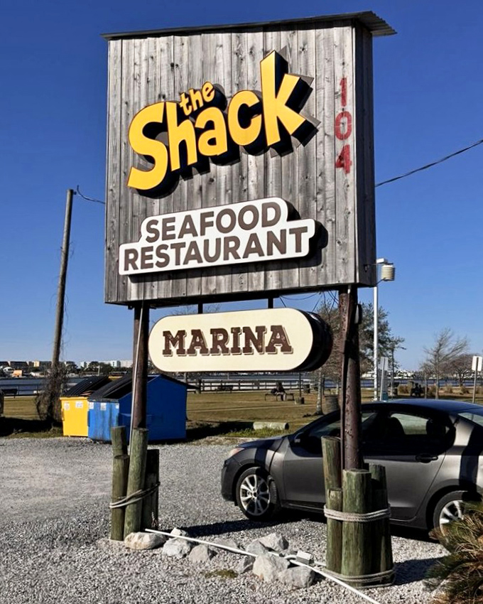 No fancy signage needed when the food speaks for itself, but The Shack's weathered wooden sign perfectly captures its unpretentious coastal charm.