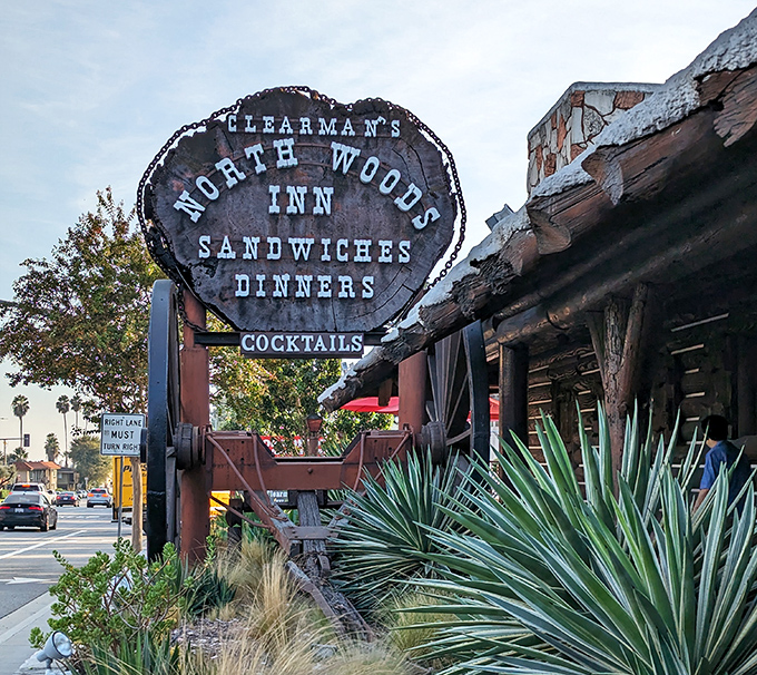 The iconic heart-shaped sign stands as a beacon for hungry travelers, promising steaks, sandwiches, and cocktails beneath its snow-dusted edges.
