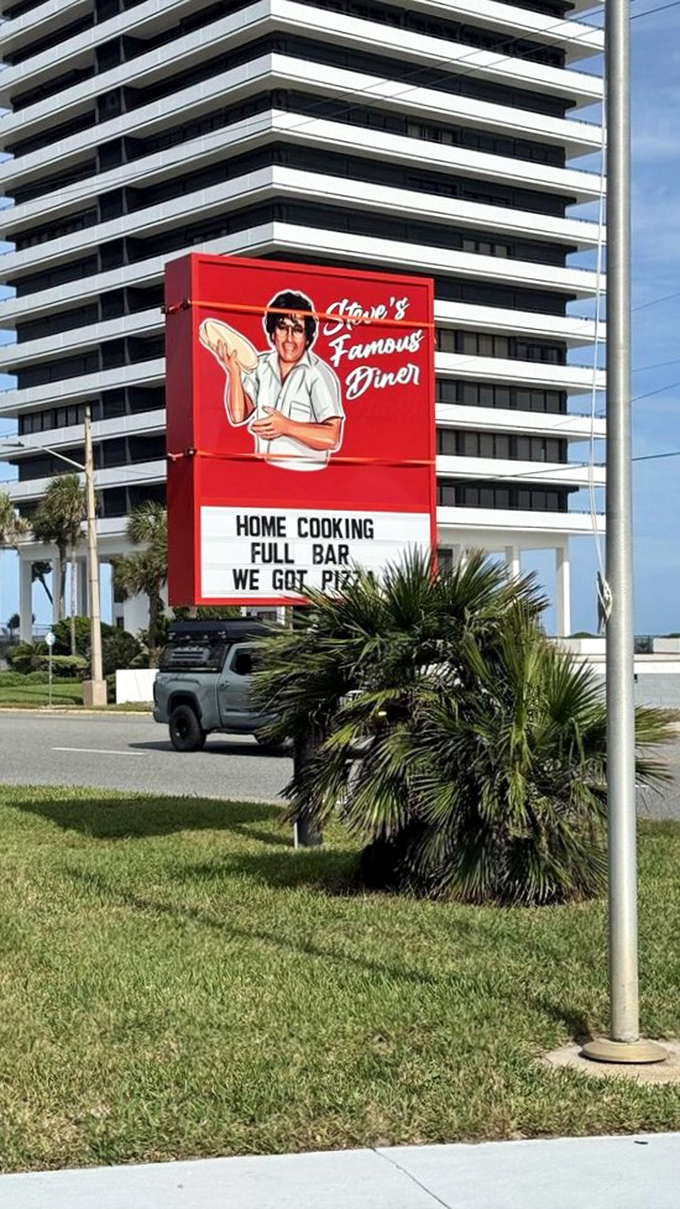The sign says it all – "Home Cooking, Full Bar, We Got Pizza" – a trifecta of promises that covers all the essential food groups of vacation dining.