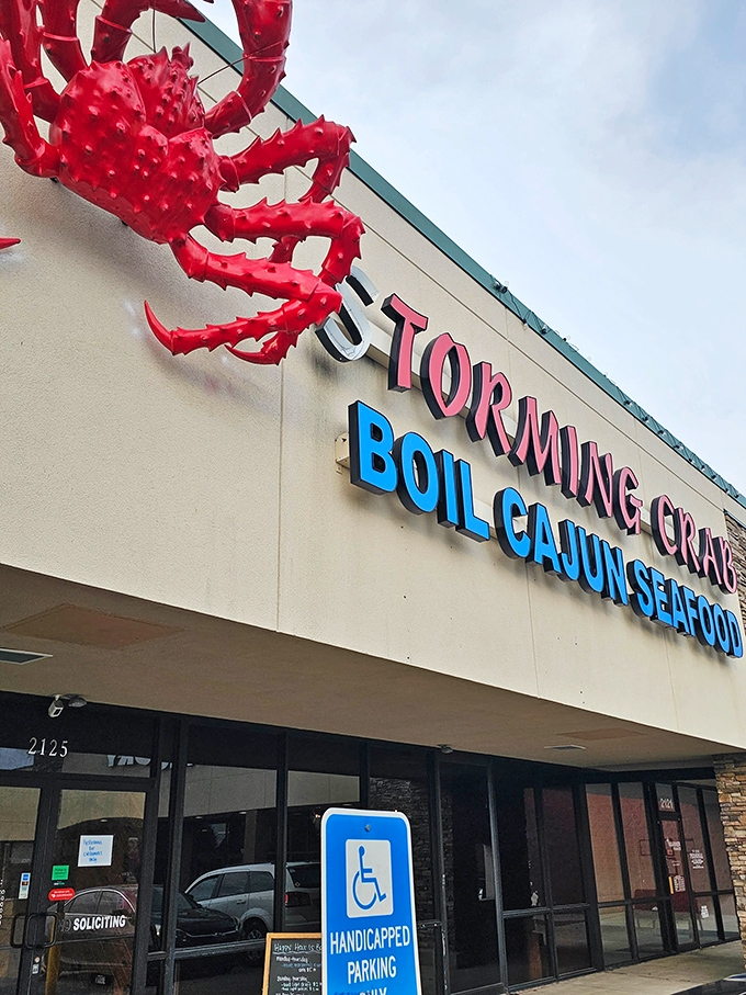 Up close with the restaurant's mascot&mdash;a giant red crab that seems to say, "Come on in, the butter sauce is fine!"