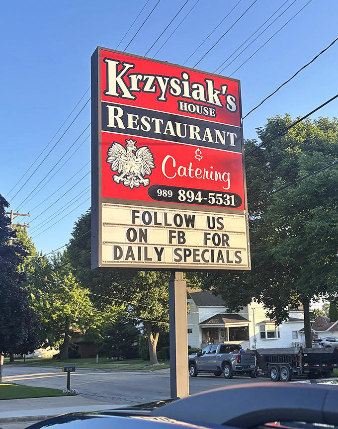 The roadside sign that's guided hungry travelers for years, standing tall against Michigan skies like a delicious North Star.