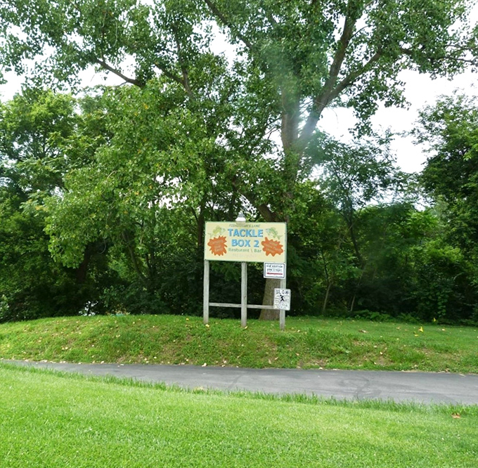 The modest roadside sign gives no hint of the culinary treasures and sensory overload waiting just down the path. Best kind of surprise.