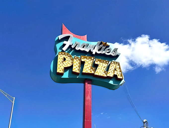 That mid-century modern sign stands as a colorful landmark against the Miami sky &ndash; a retro beacon guiding the pizza faithful home.