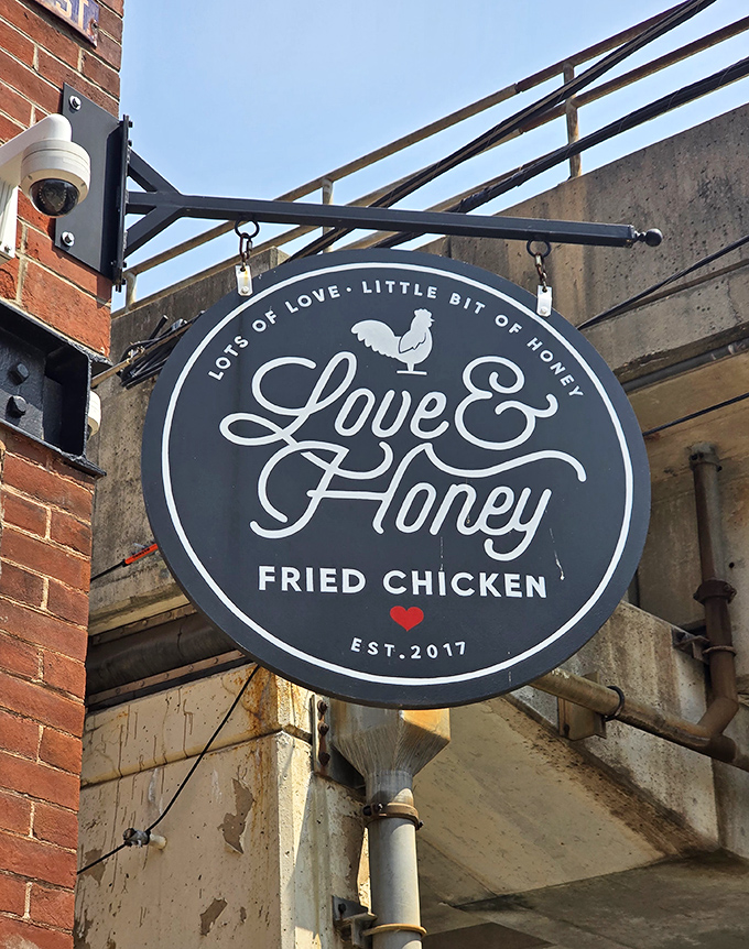 The hanging sign promises "Lots of Love, Little Bit of Honey"&mdash;perhaps the most honest advertising in the food business. That little red heart says it all.